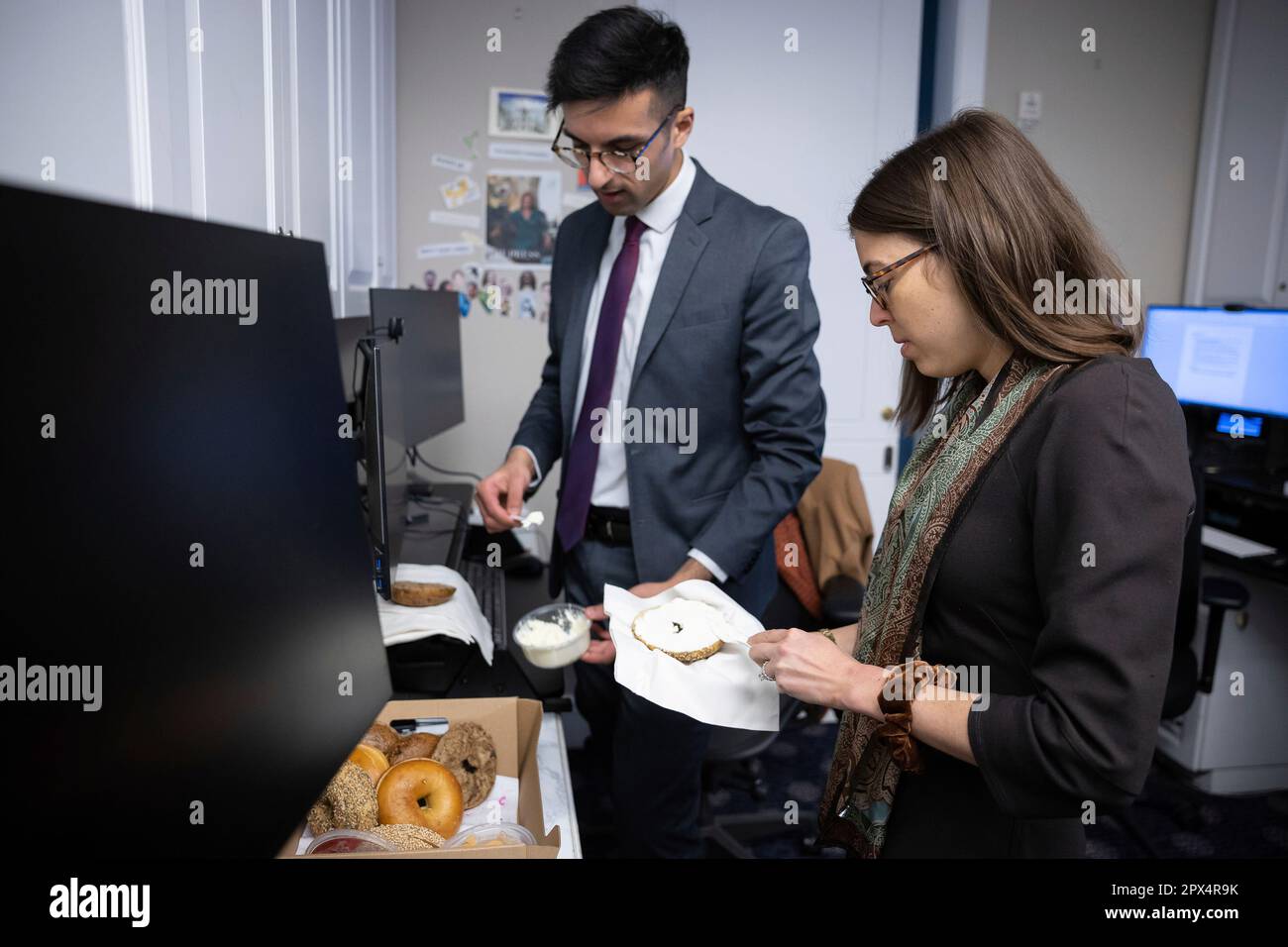 From left, White House Assistant Press Secretary Abdullah Hasan and ...