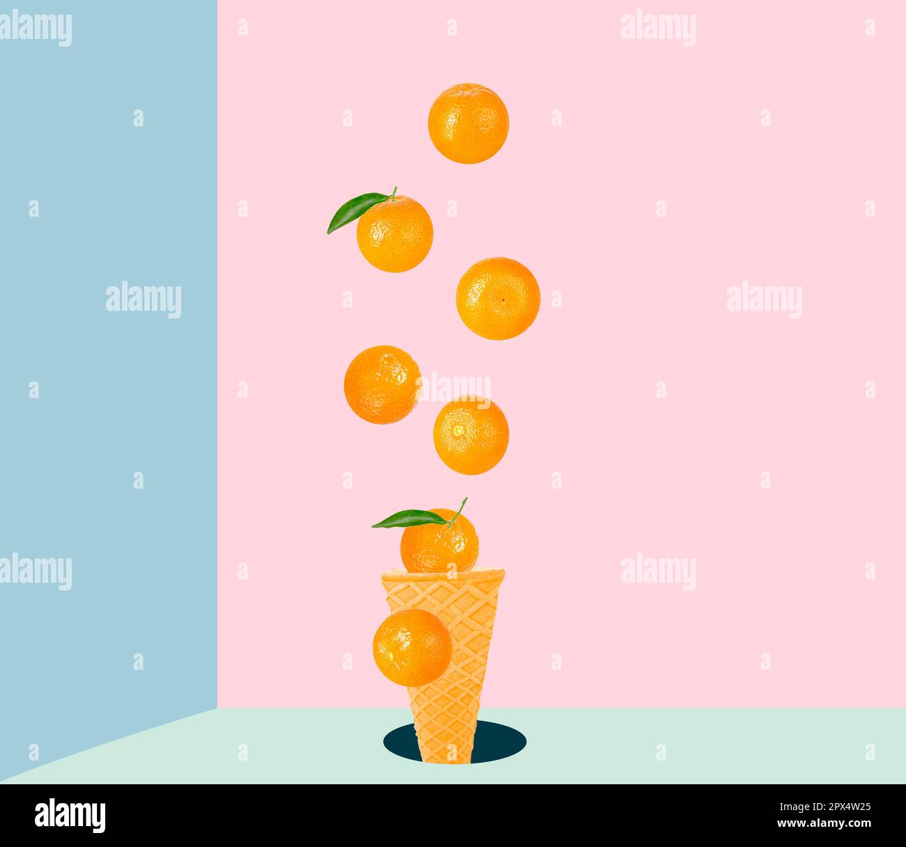 Isolated ice cream cone with fruits in the air. Seven falling whole ...
