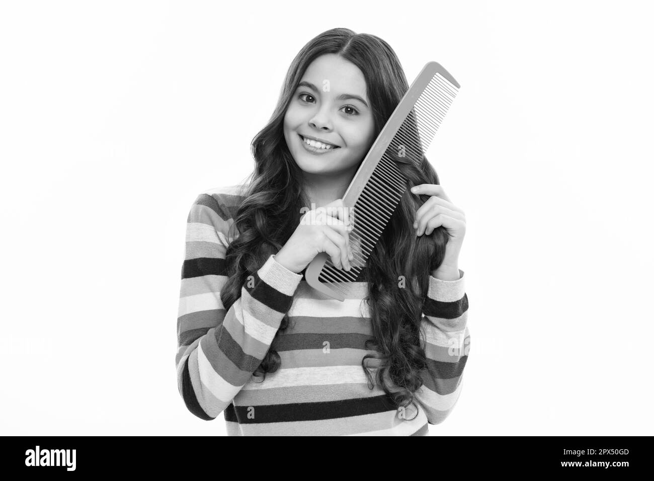 Combing hair teen Black and White Stock Photos & Images - Alamy