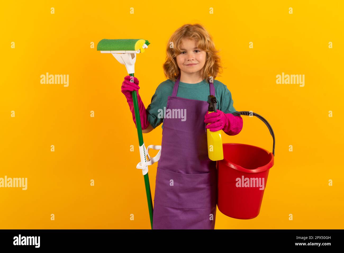 Little kid cleaning at home. Child doing housework having fun. Studio ...