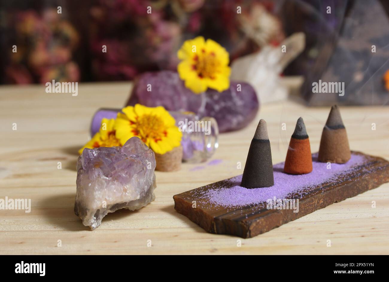 Incense Cones on Stone Slab With Rock Crystals and Flowers Stock Photo ...