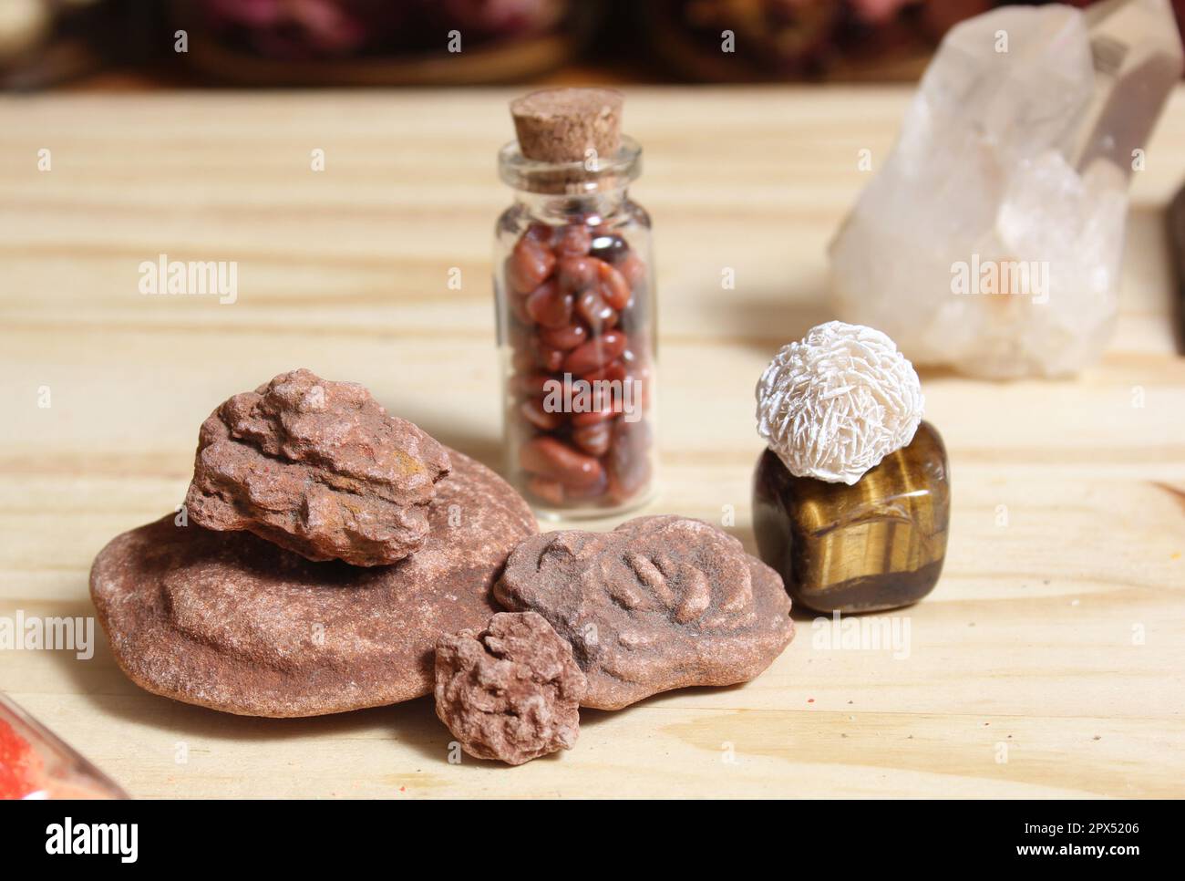 Desert Rose Rock Varieties With Jar of Agate Stones Stock Photo - Alamy