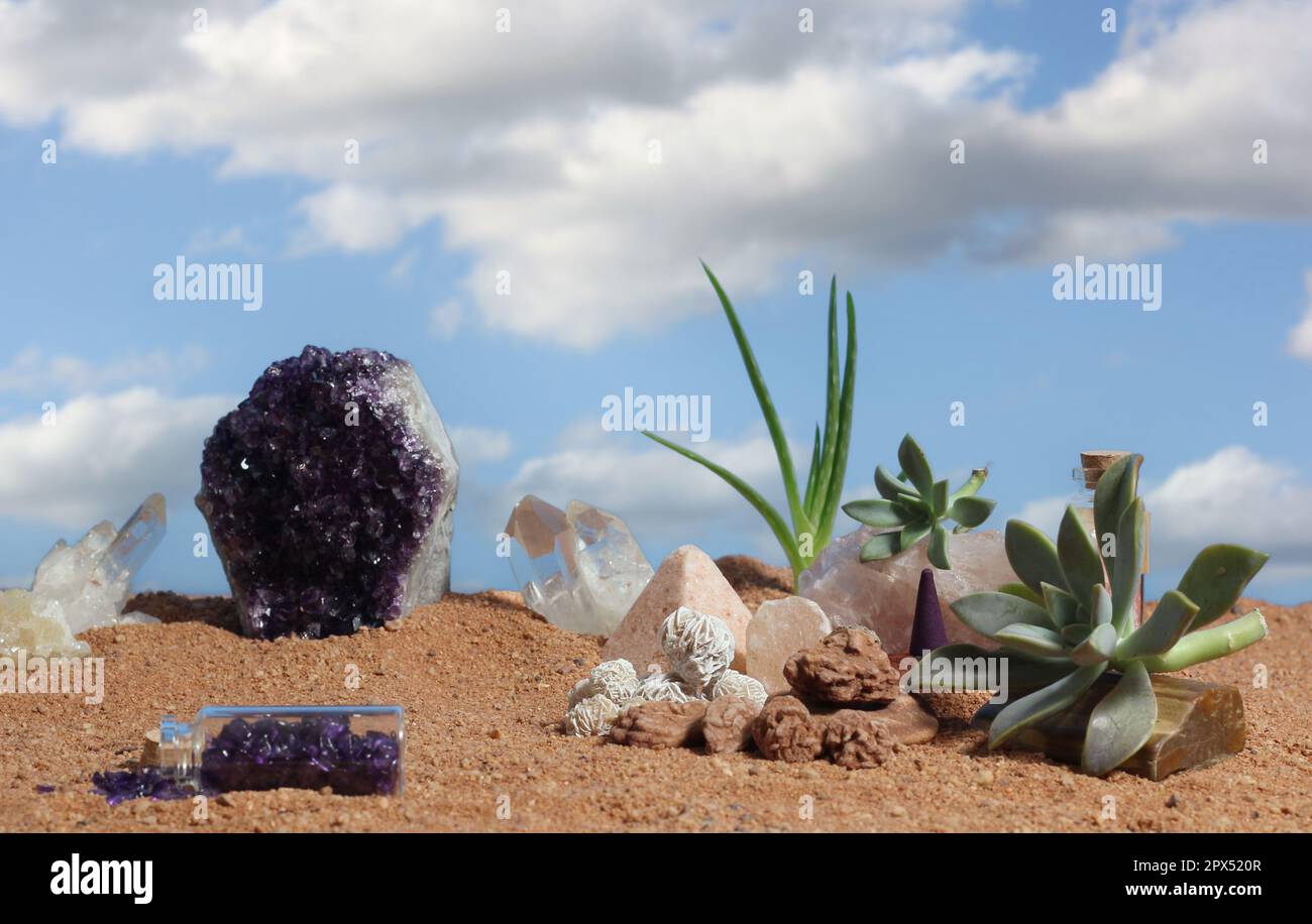 Chakra Stones and Flowers on Australian Red Sand Meditation Altar Stock ...