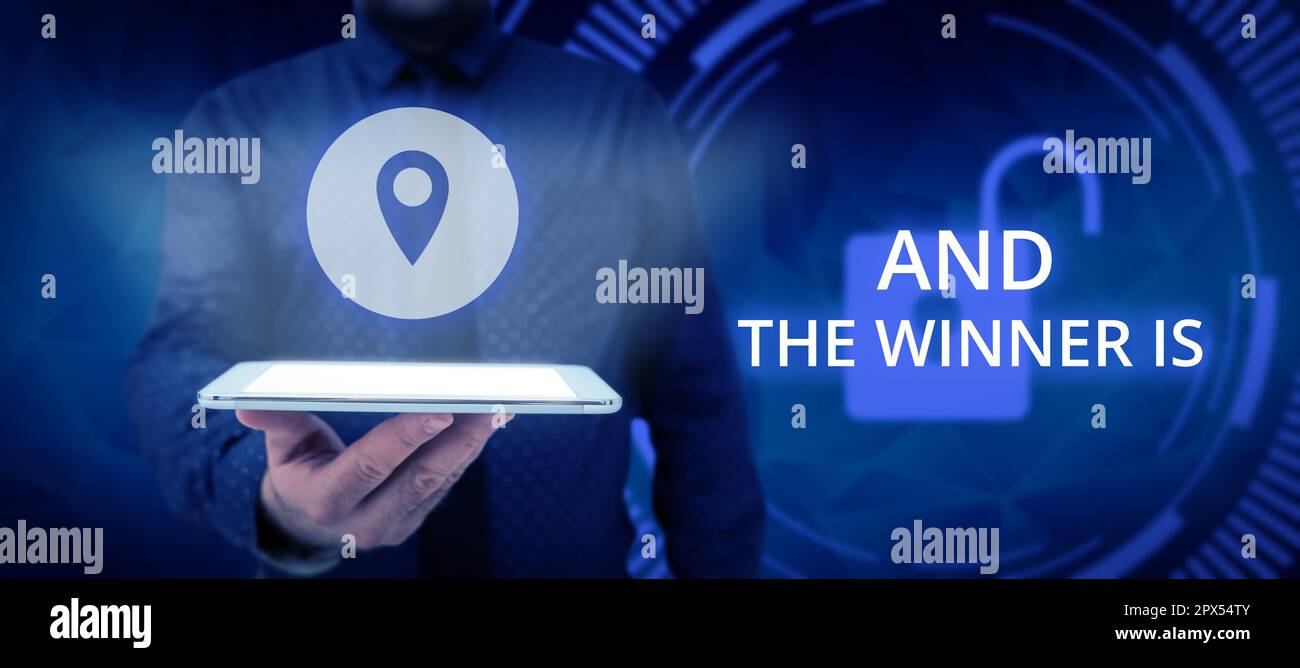 Hand writing sign And The Winner Is, Word for written spoken results of ...