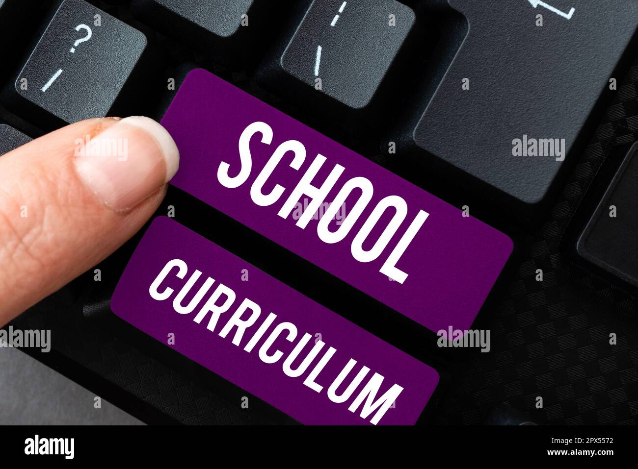 Sign displaying School Curriculum, Word Written on designed to provide ...