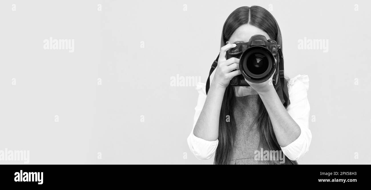 happy teen girl photographer taking picture with digital photo camera ...
