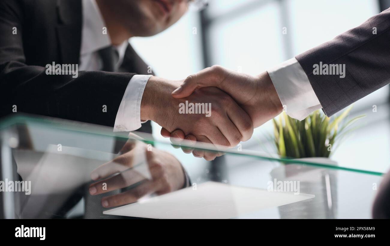 Handshake is symbol of starting finishing negotiations, successful ...