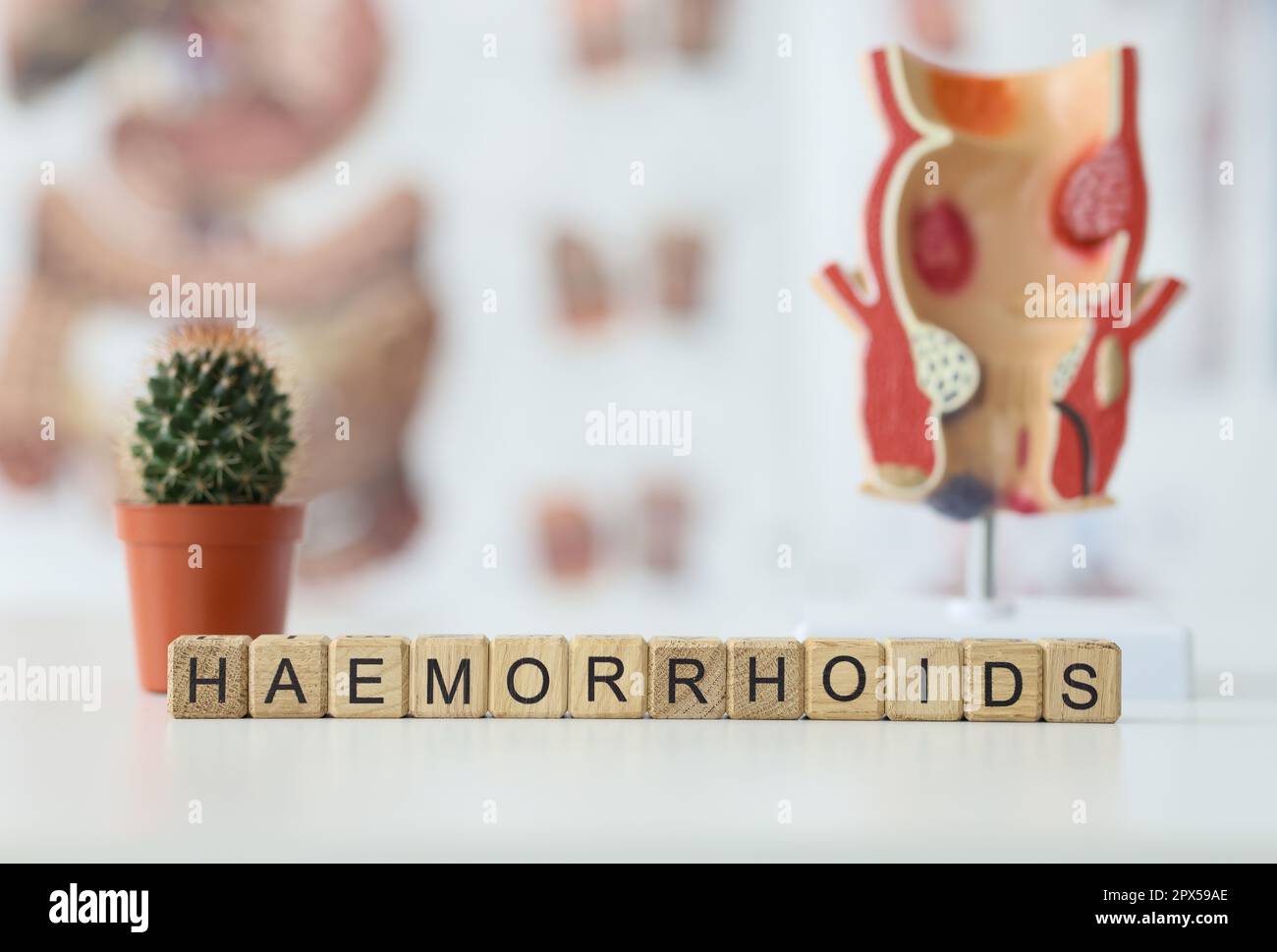 Word Hemorrhoids made of wooden cubes against rectal model Stock Photo ...