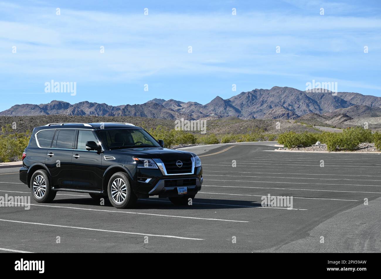 Black SUV parked in a car park in the desert of Nevada Stock Photo - Alamy