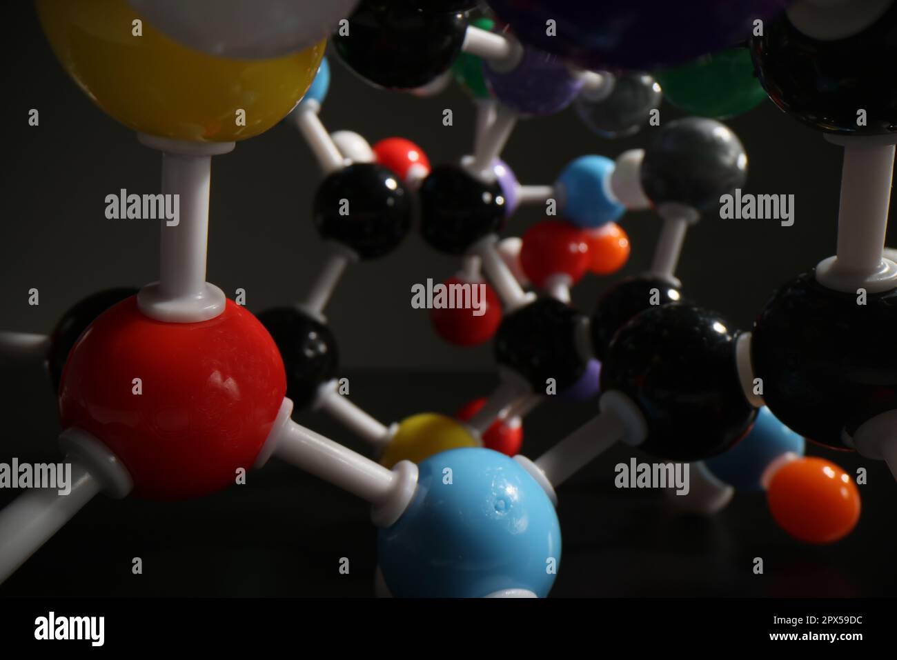Realistic model of molecular compounds on dark background Stock Photo ...