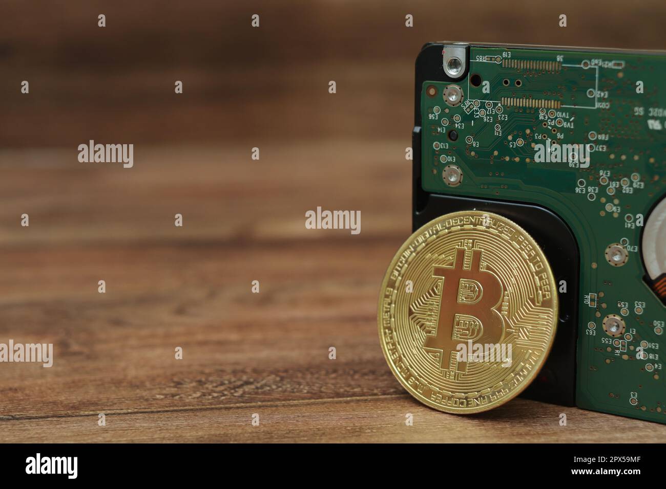 a pile of bitcoin placing above the hard disk. Cryptocurrency trading ...