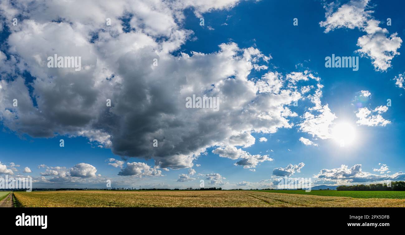 Panoramic view of thundercloud with horizon at the bottom of the image ...