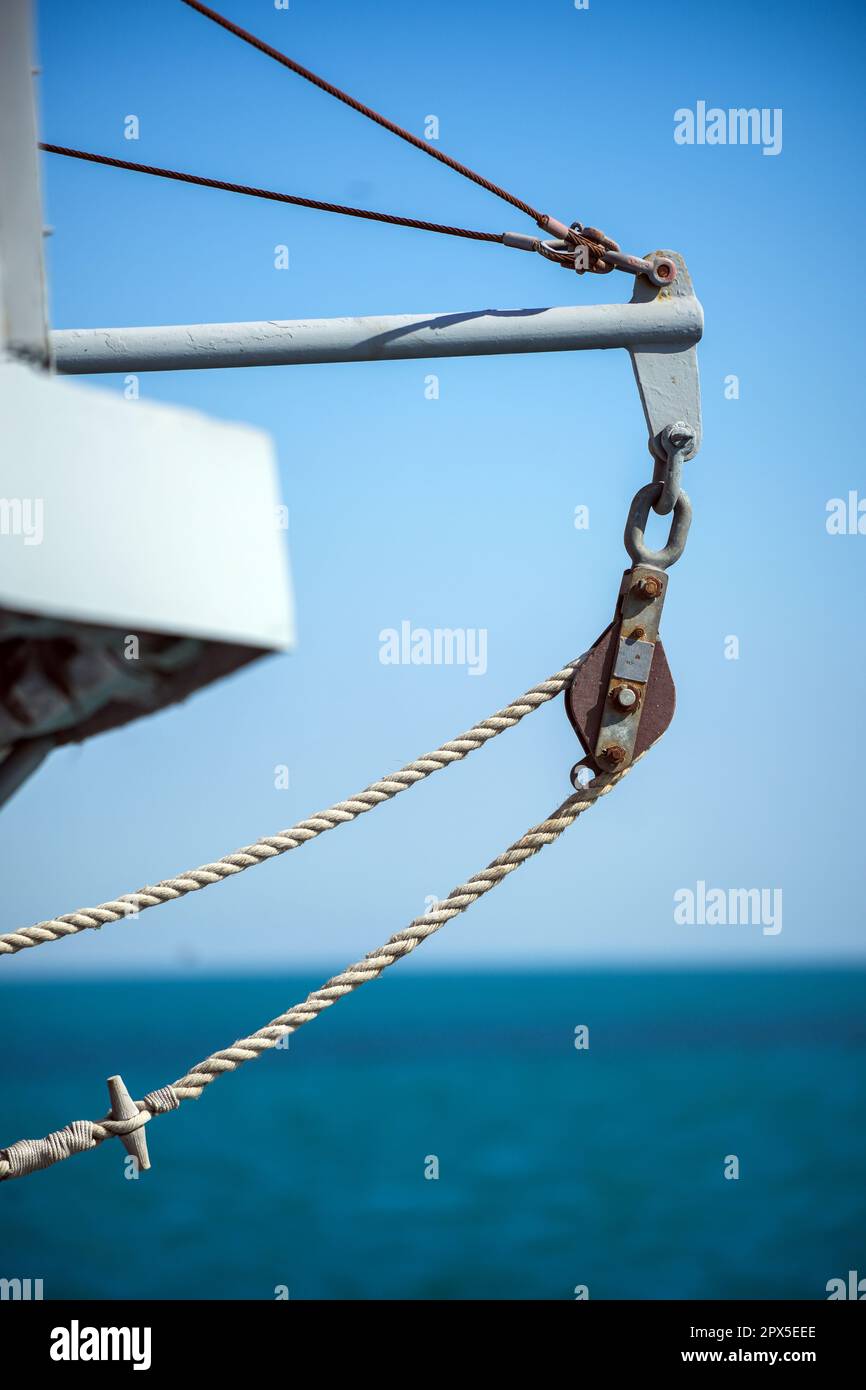 Pulley and some ropes on a military ship Stock Photo - Alamy
