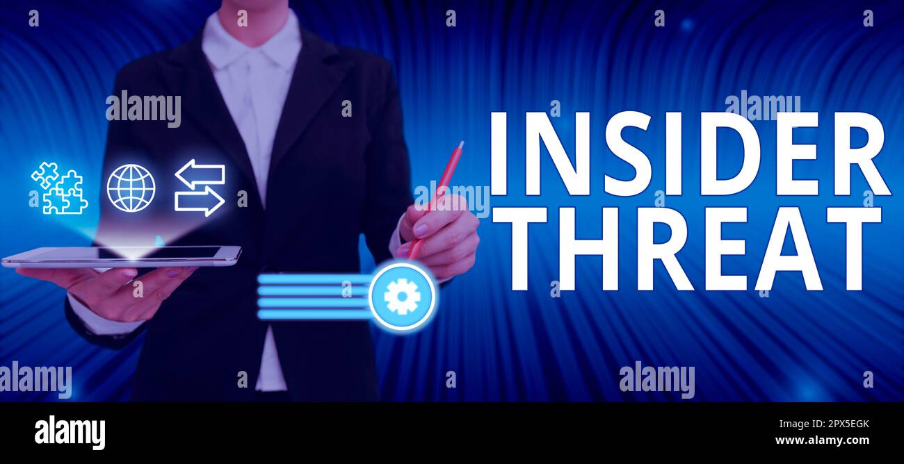 Hand writing sign Insider Threat, Word for security threat that ...