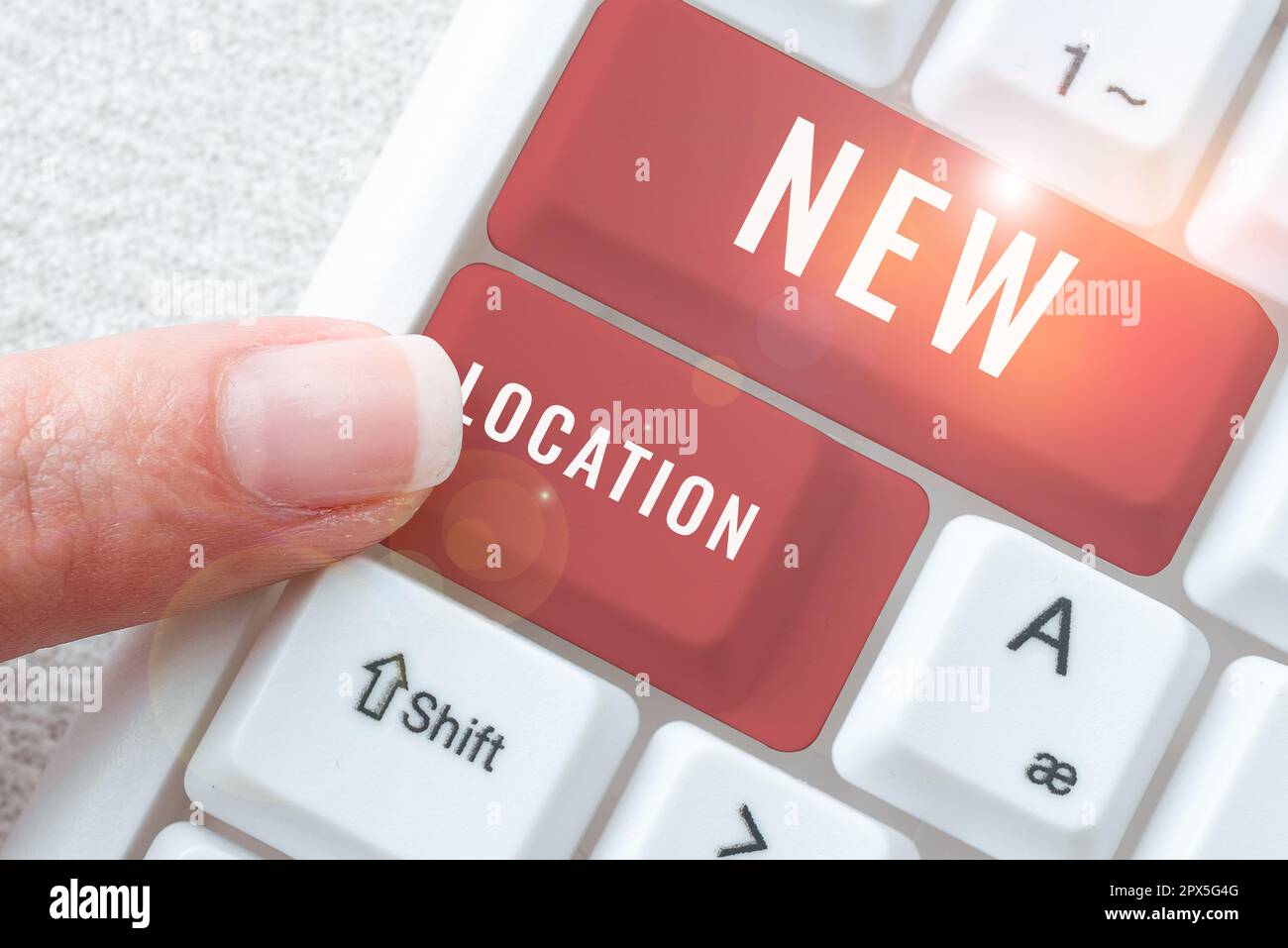 Hand writing sign New Location, Word Written on Get located on a new ...