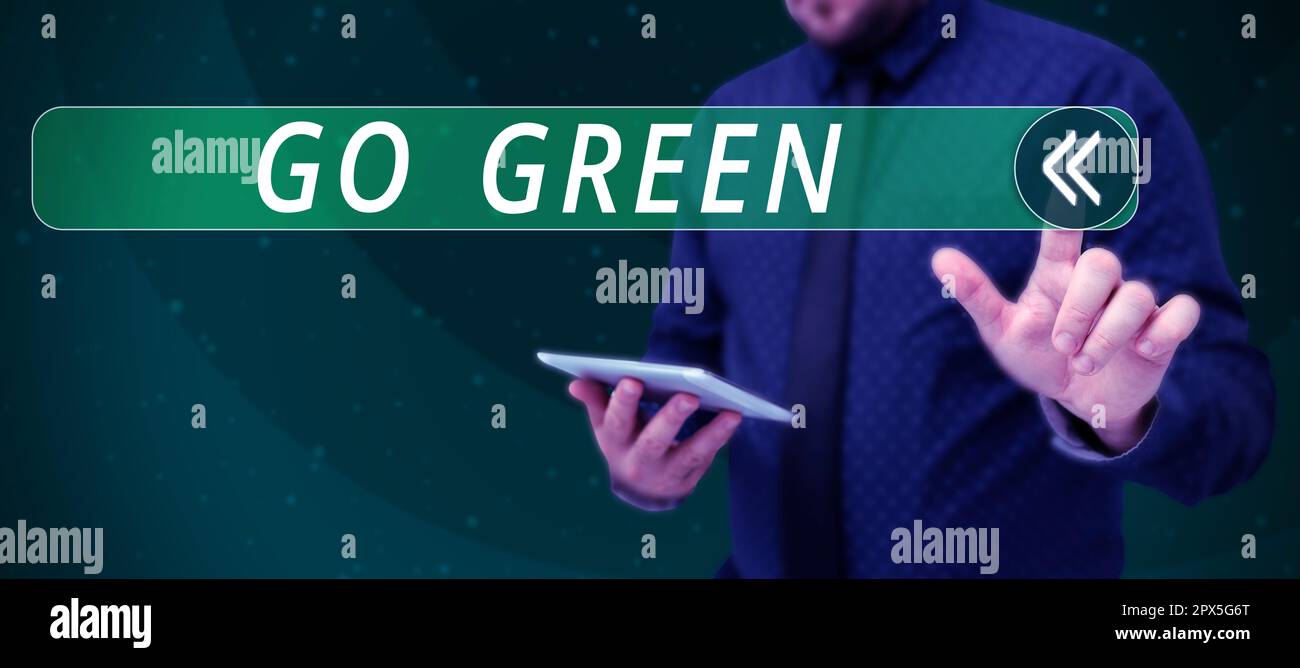 Writing displaying text Go Green, Word for making more environmentally ...