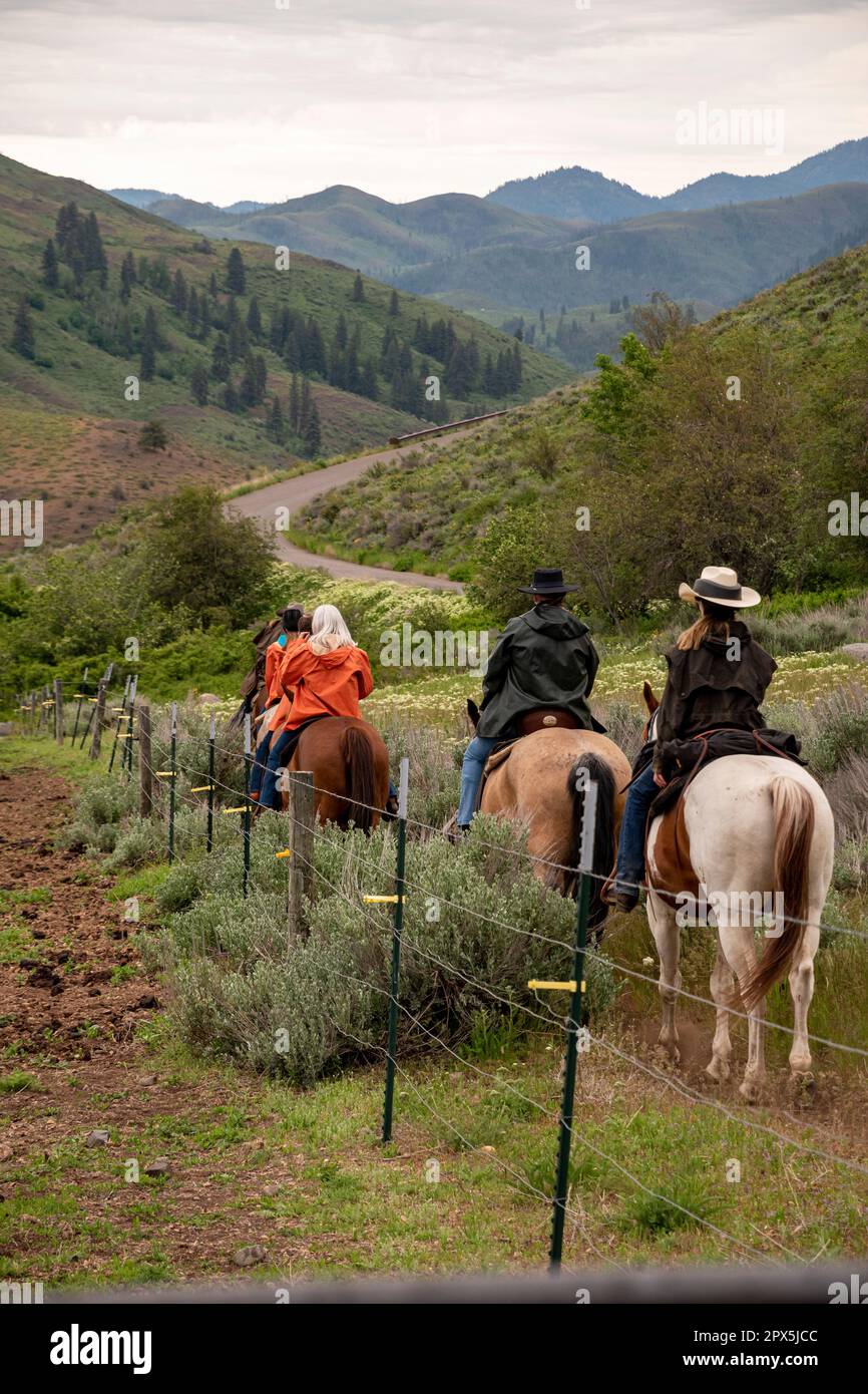 Women ride horses along a trail near Sun Mountain Lodge in Winthrop ...