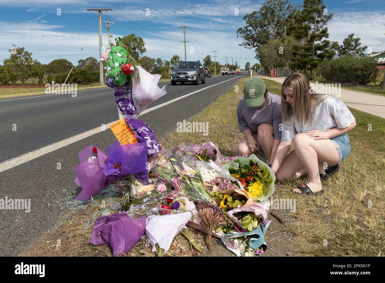 People leave tributes at the scene of a fatal multi-car accident in ...