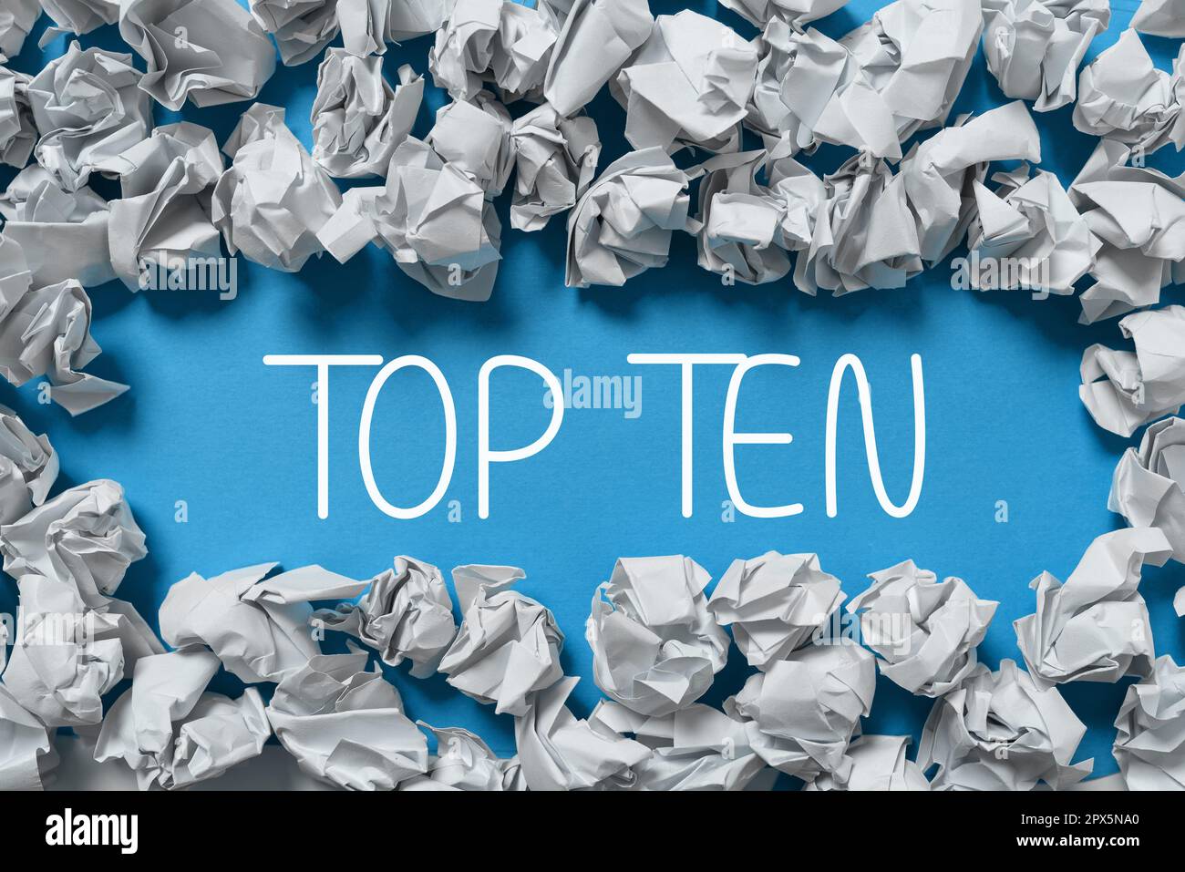 Sign displaying Top Ten, Business overview the ten most popular songs ...