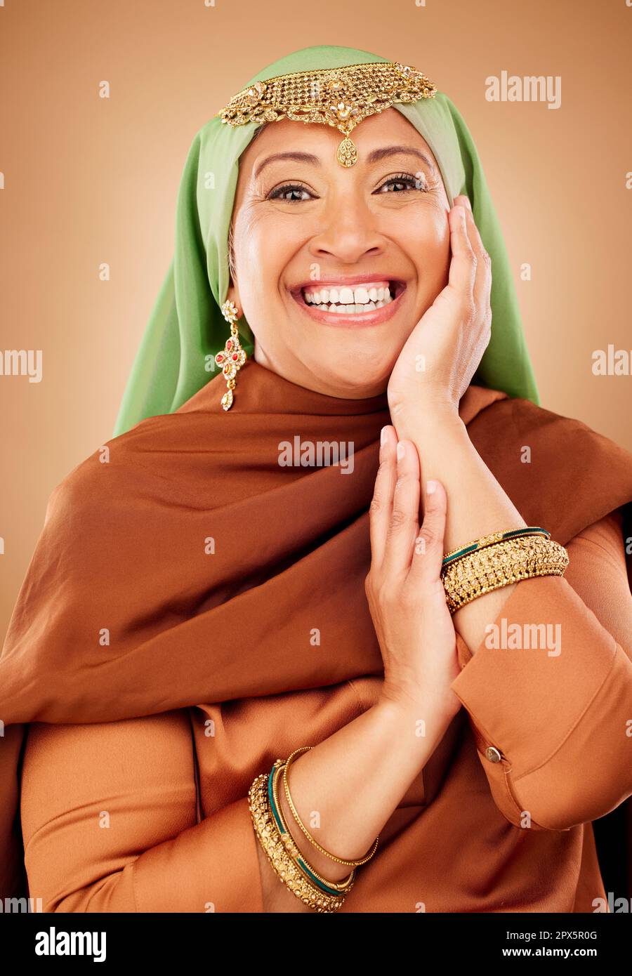 Portrait, face and skincare with a muslim woman in studio on a brown ...