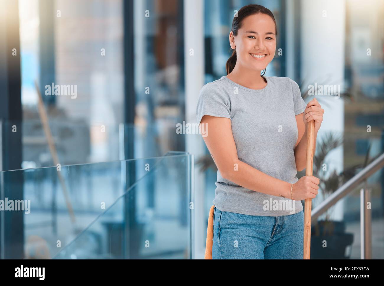 Cleaning, broom and portrait of woman cleaner working in modern office ...