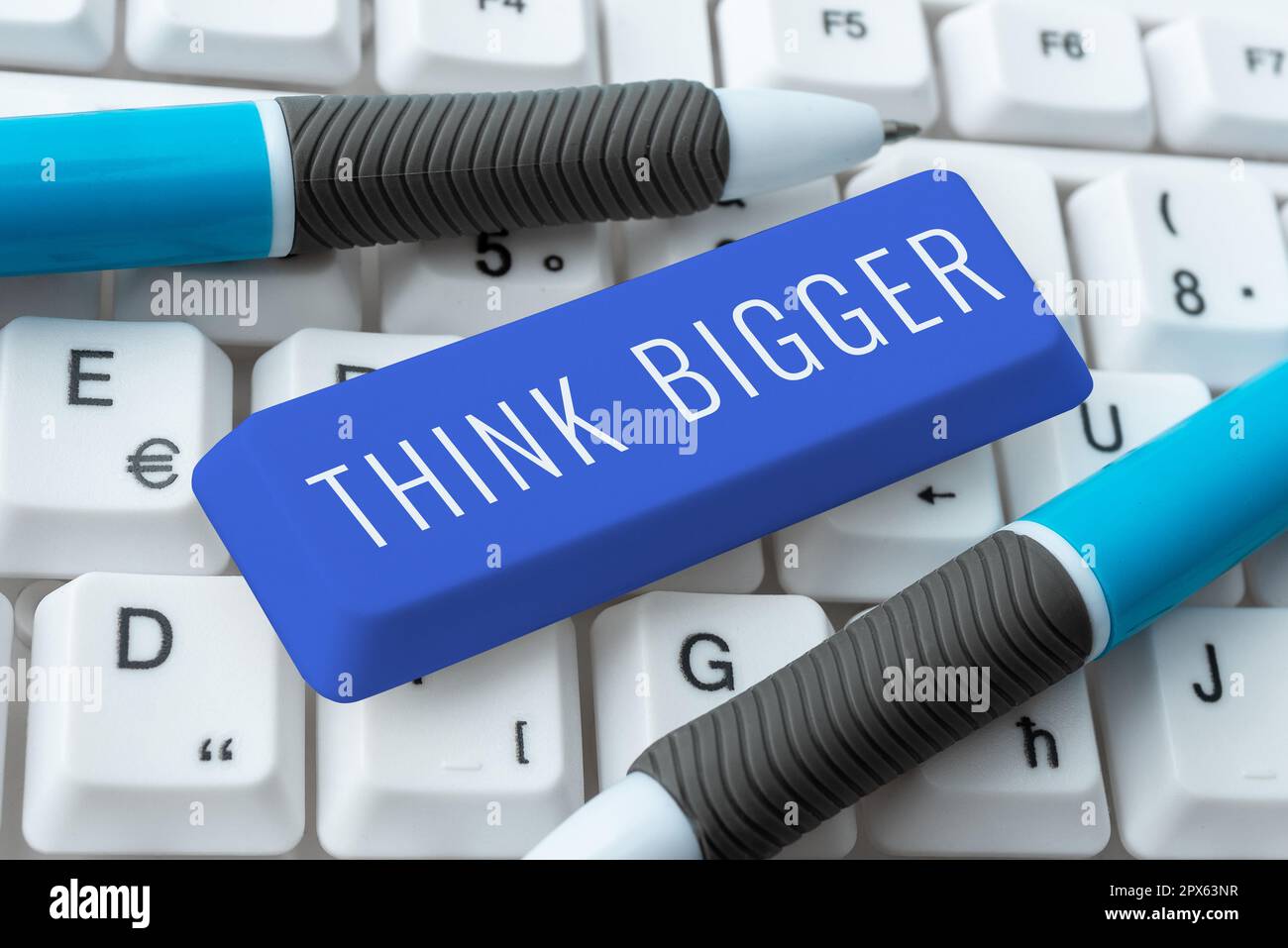 Hand writing sign Think Bigger, Internet Concept being able to dream ...