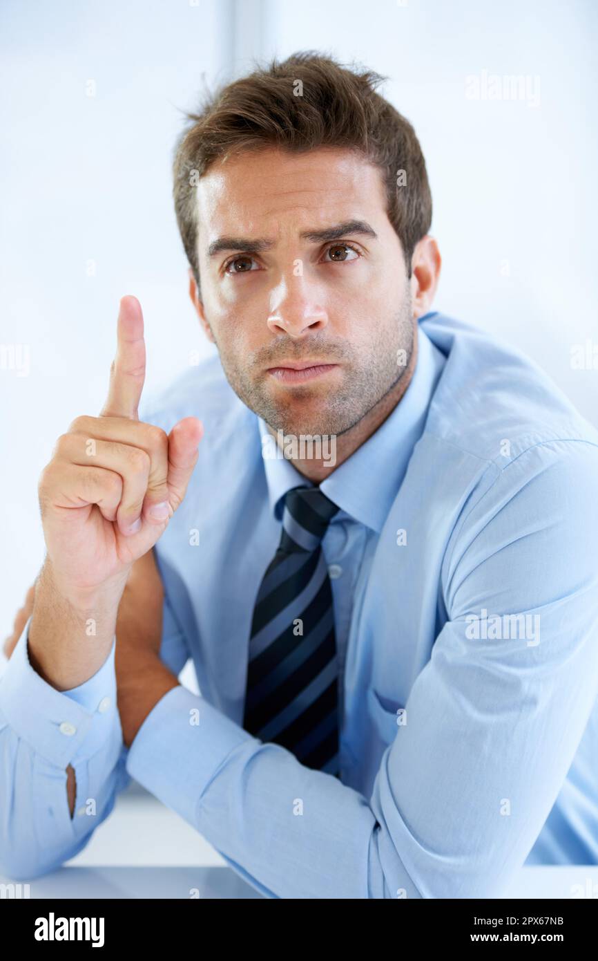 The modern professional. a handsome young businessman at work Stock ...