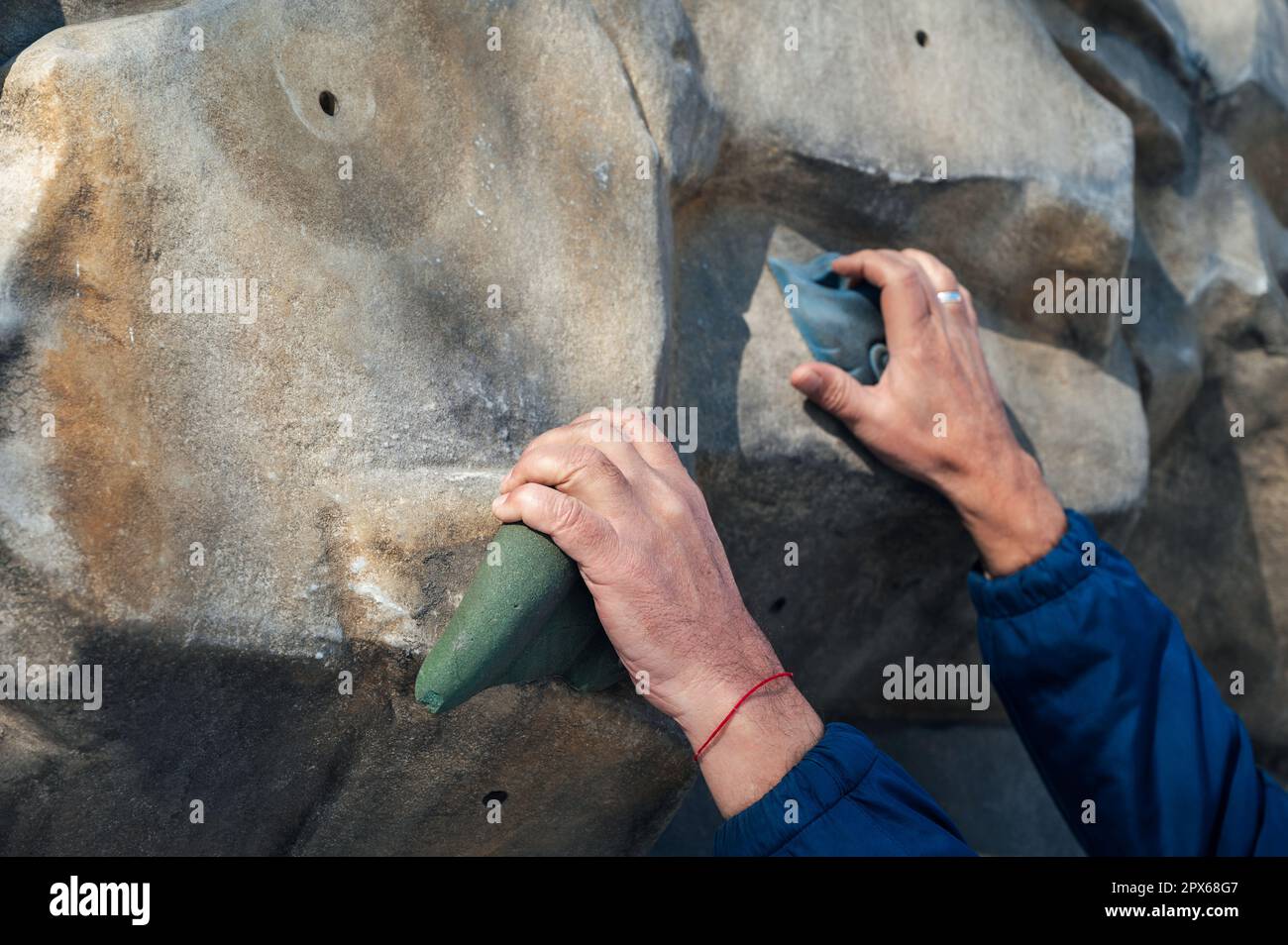 hands of a male climber training on a climbing wall Stock Photo - Alamy