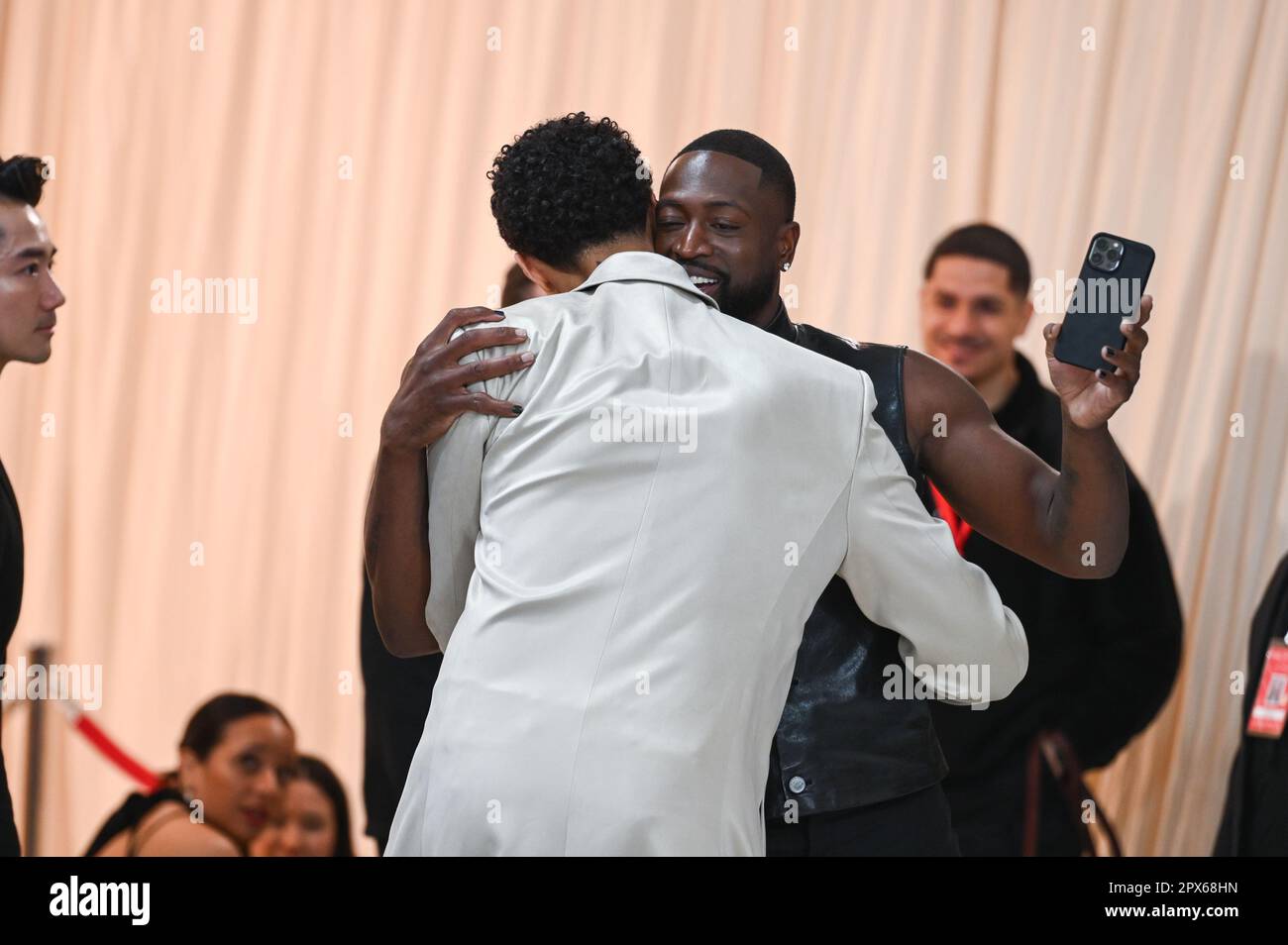New York, USA. 01st May, 2023. Brittney Griner and Dwyane Wade hug on the red carpet at the 2023 ...