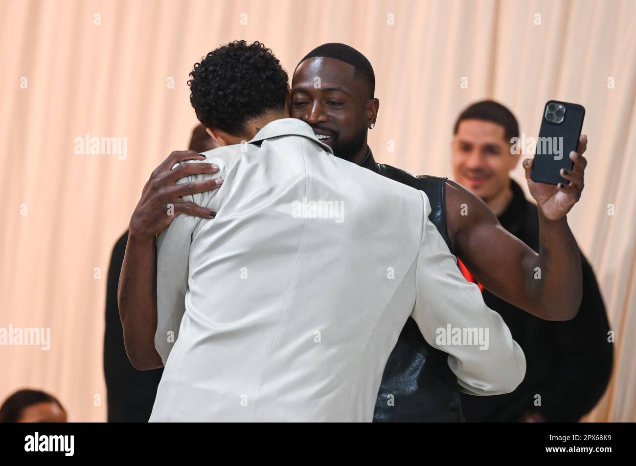 New York, USA. 01st May, 2023. Brittney Griner and Dwyane Wade hug on the red carpet at the 2023 ...