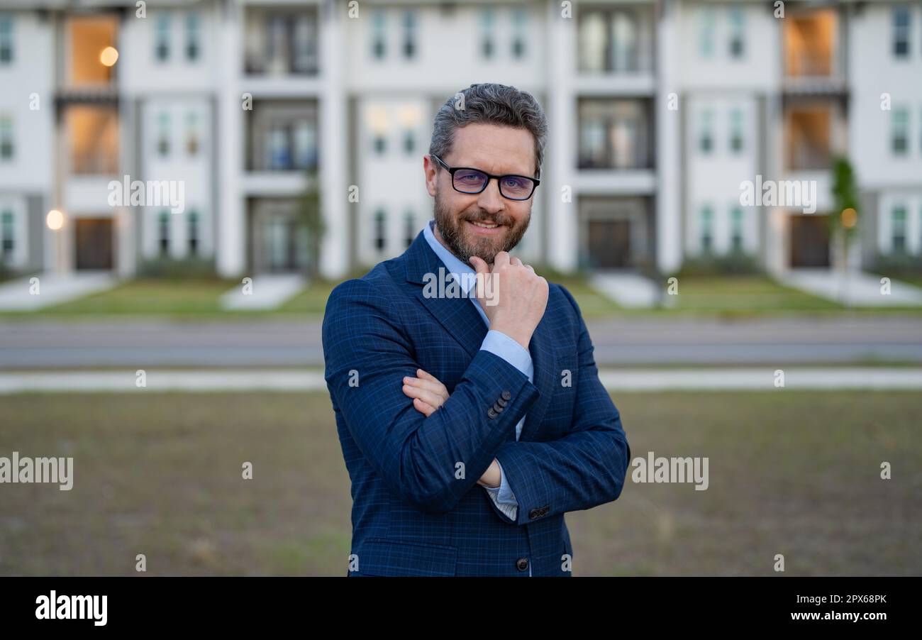 happy salesman in the suit. salesman outdoor. photo of salesman ...