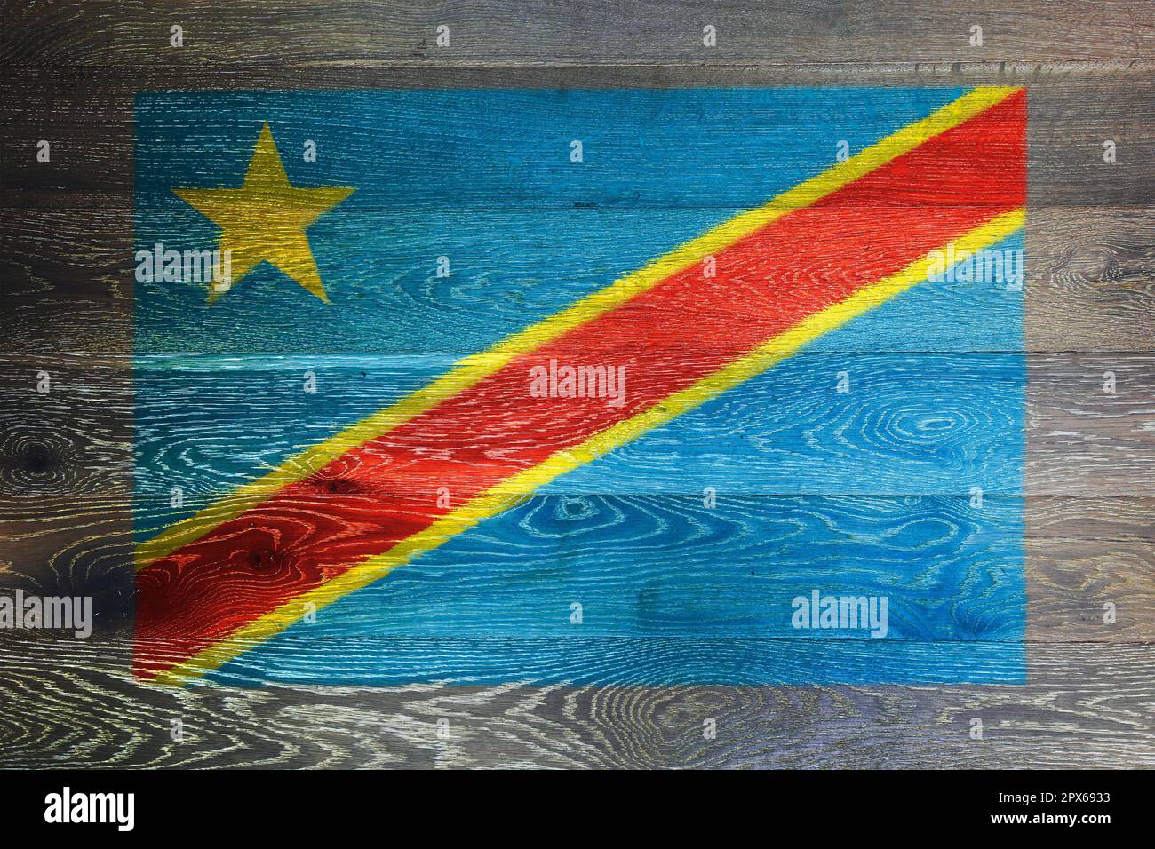 A Democratic Republic of Congo flag on rustic old wood surface ...
