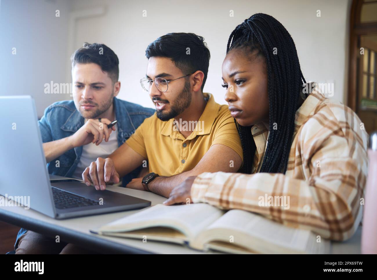 Laptop, study and students group with online course, elearning or ...