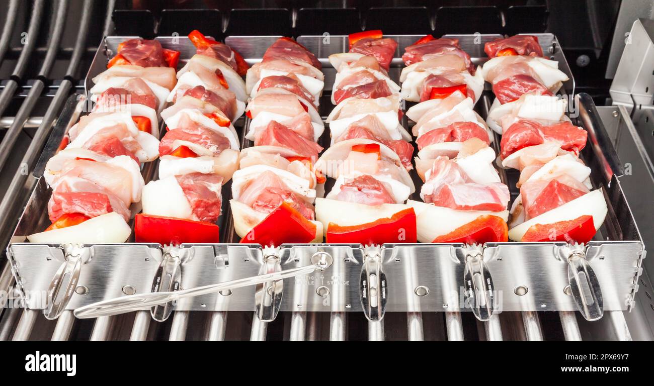 Detail of meat preparation for a barbecue Stock Photo - Alamy