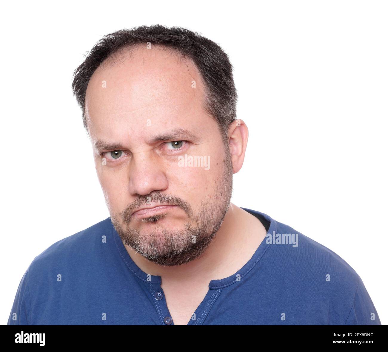 middle aged man looking skeptical and unhappy Stock Photo - Alamy