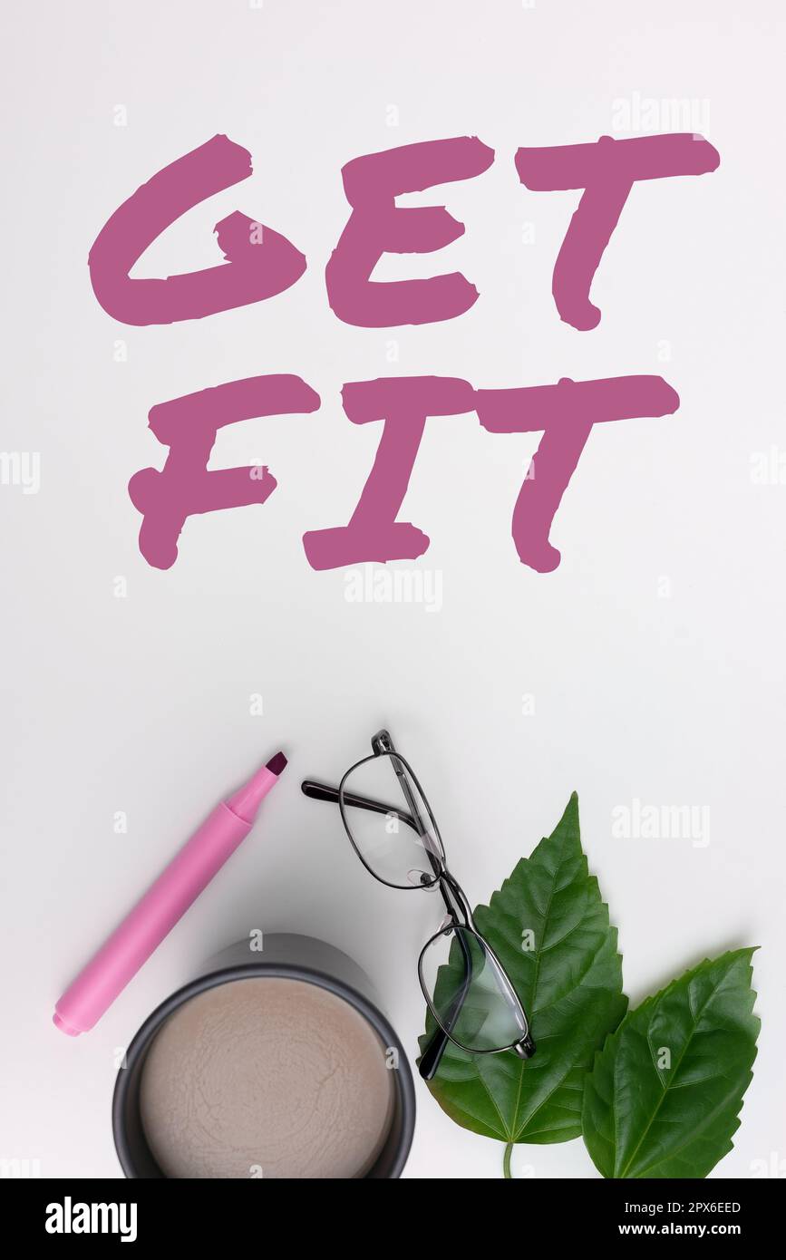 Hand writing sign Get Fit, Word for right size or shape for someone or ...