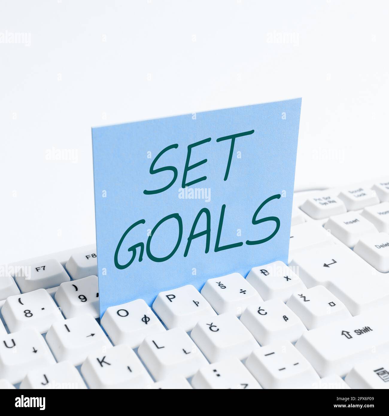 Writing displaying text Set Goals, Word Written on Defining or ...