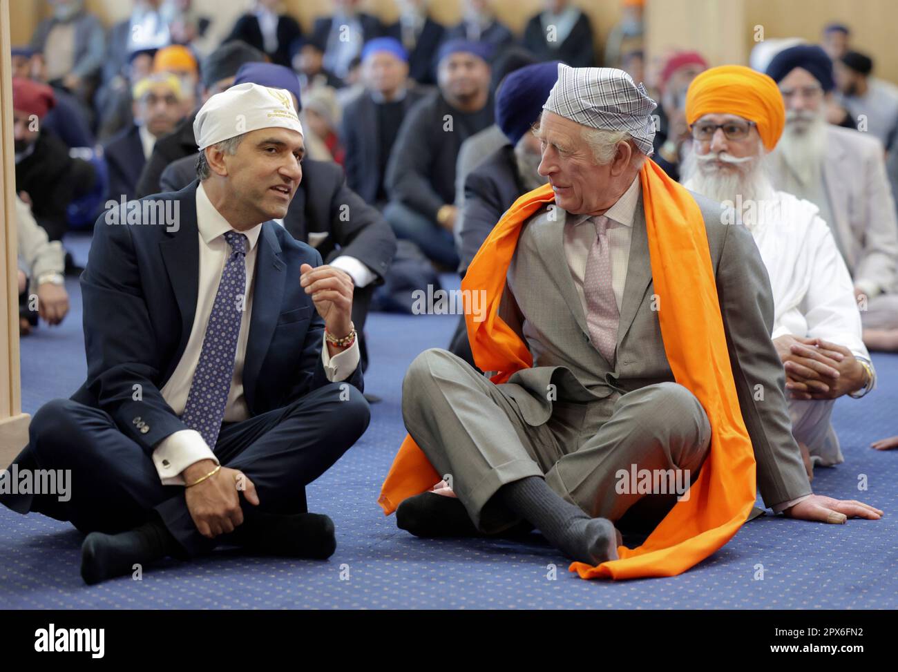 FILE - Britain's King Charles III, right, speaks with Professor Gurch ...