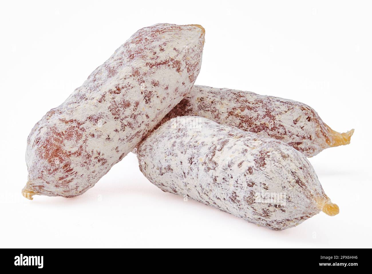 Closeup view of fermented mini parma sausages covered with white mold ...