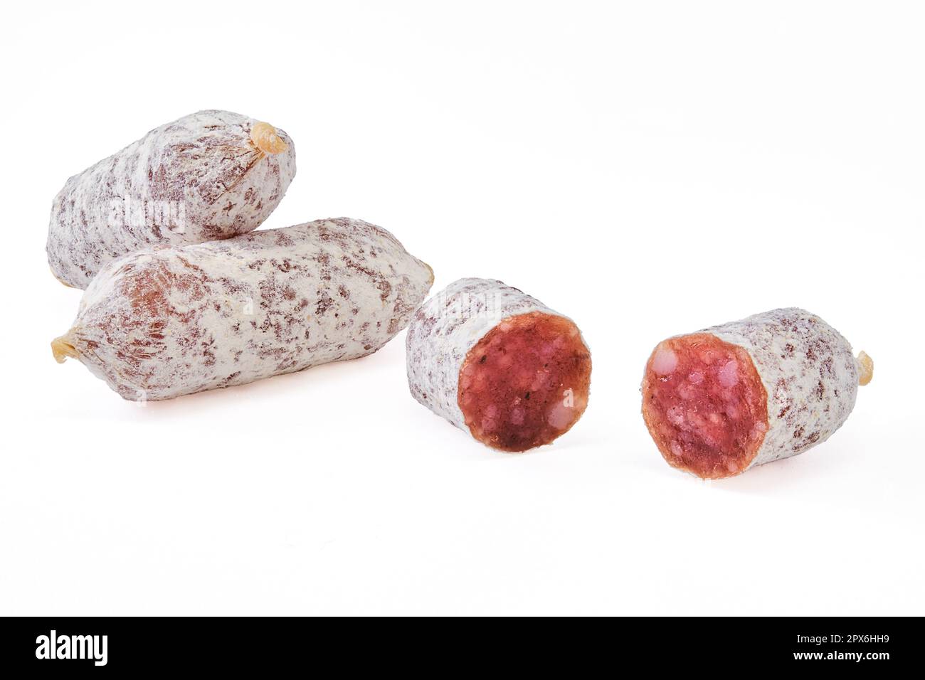 Closeup view of fermented mini parma sausages covered with white mold ...