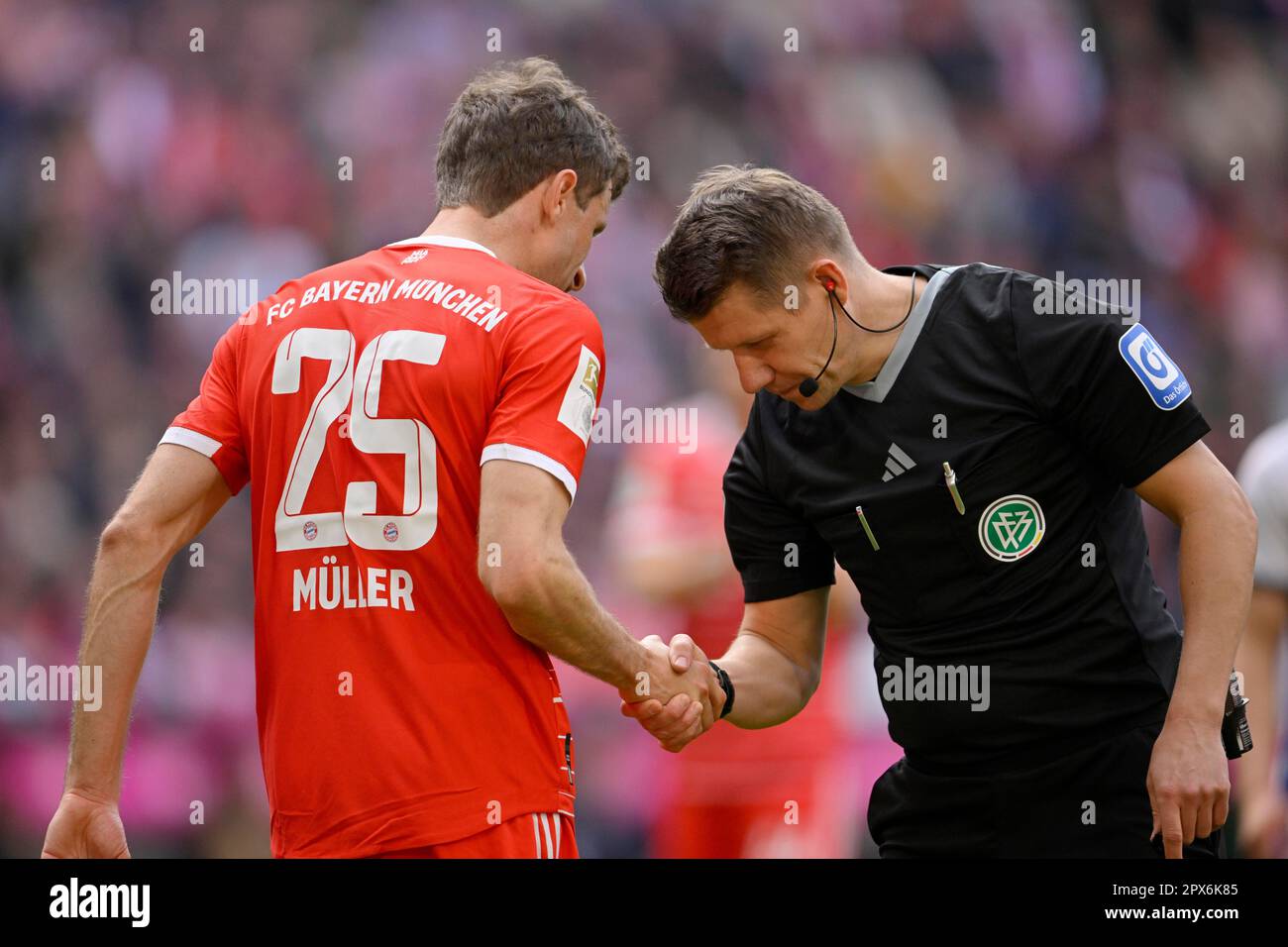 Referee Referee Patrick Ittrich, shakes hands with Thomas Mueller FC ...