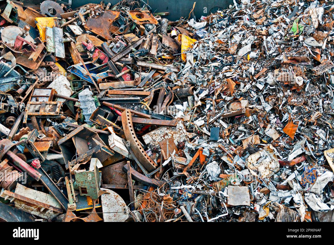 Colorful and sorted scrap metal at a scrap yard awaits recycling Stock ...