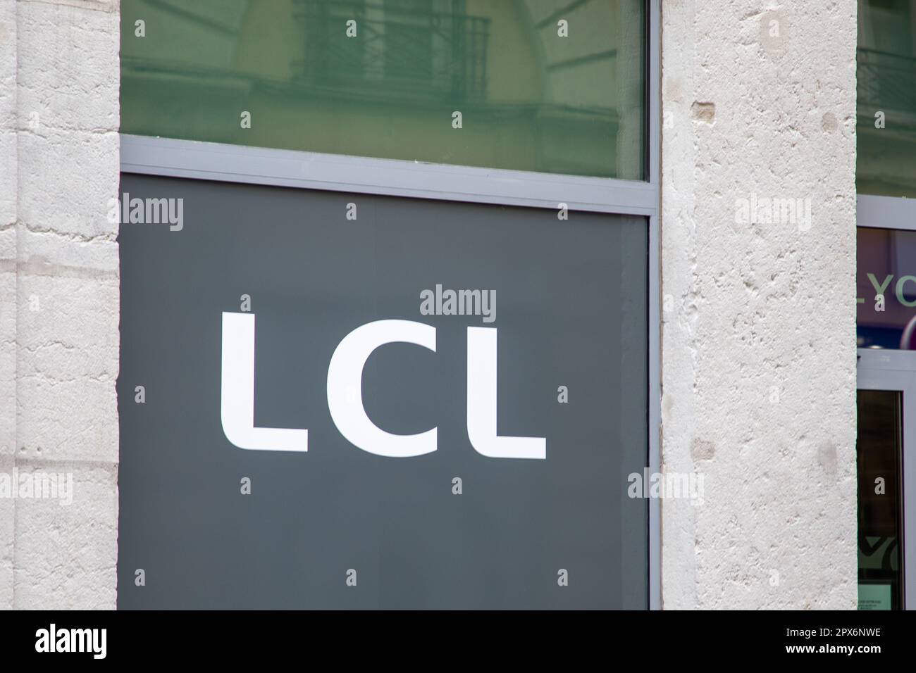 lyon , Aura France - 04 24 2023 : LCL logo brand and sign text windows ...