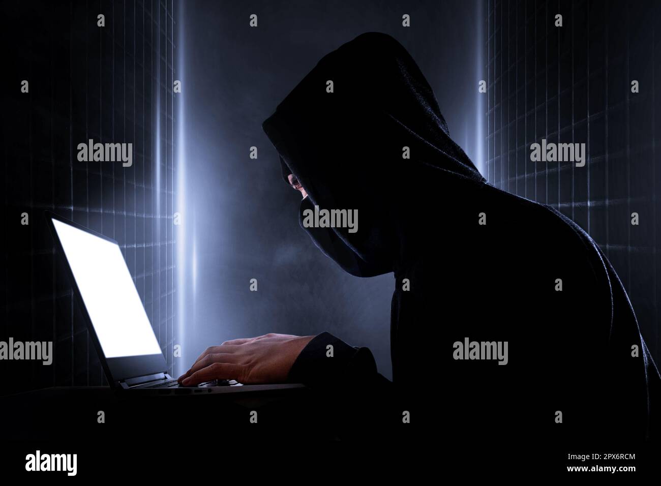 Cybercrime, hacking and technology crime. hacker with laptop. with ...