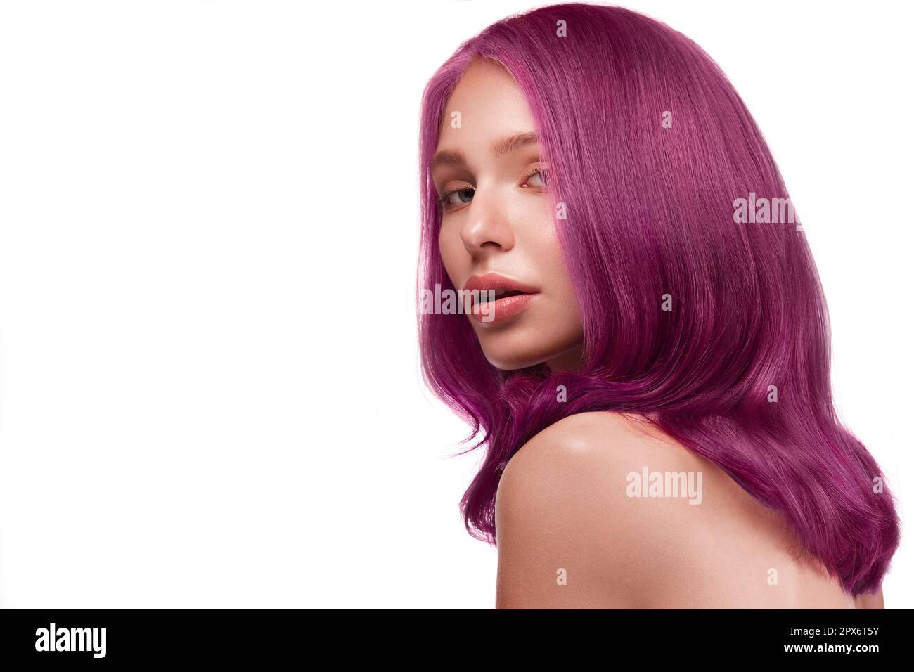 Beautiful girl with multi-colored hair and classic make-up and ...