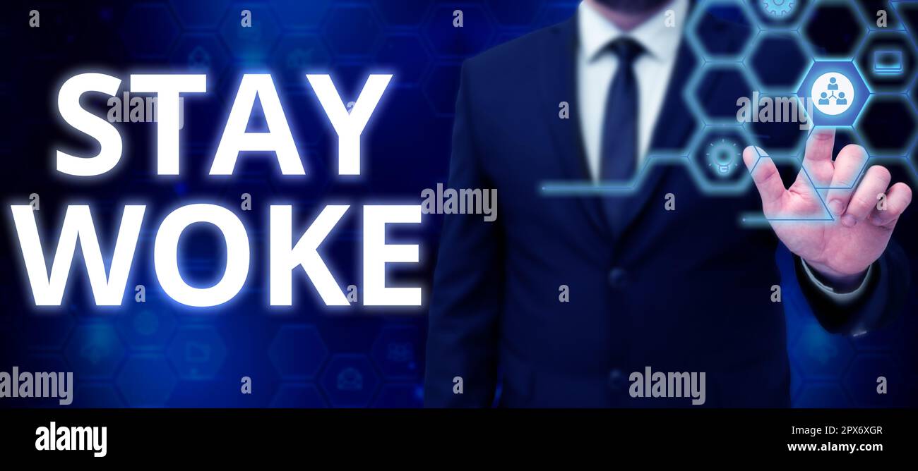Text sign showing Stay Woke, Business showcase being aware of your ...