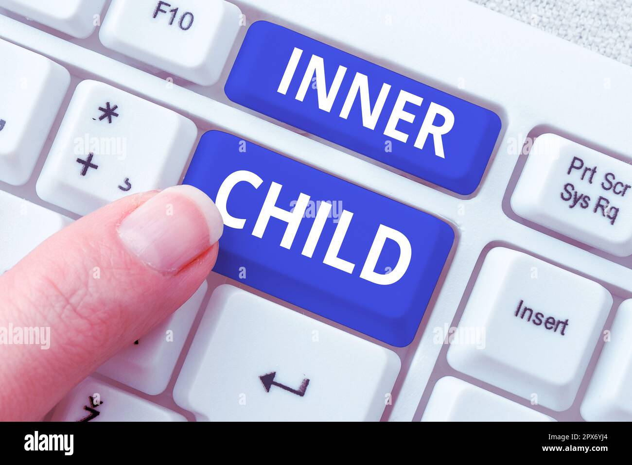 Hand writing sign Inner Child, Conceptual photo the childlike usually ...