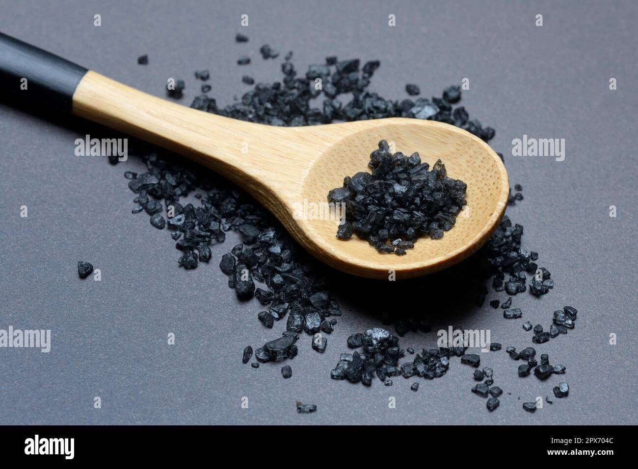 Black Hawaiian salt on spoon, sea salt with activated charcoal Stock ...