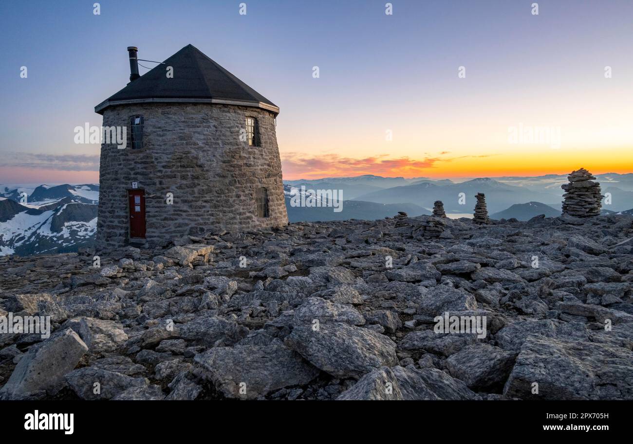 DNT's old mountain hut Skalatarnet, at the top of Skala, at sunset ...