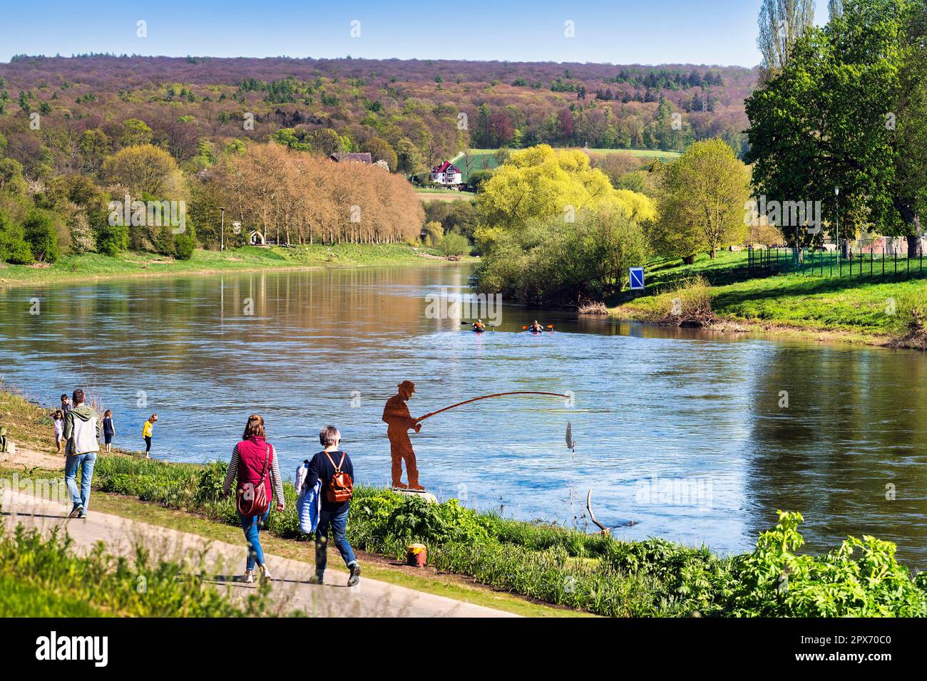 Strollers on the banks of the Weser, Hoexter, Germany Stock Photo - Alamy